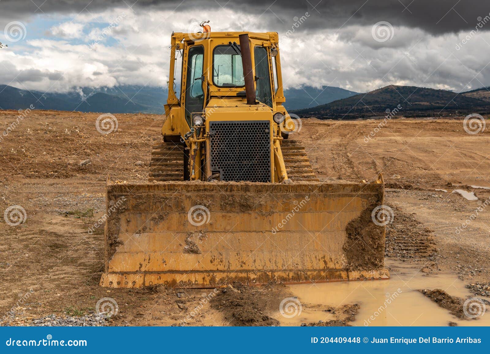 Excavator at a Construction Site, Performing Earth Moving Work Stock ...