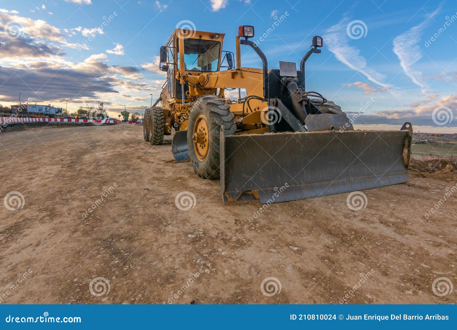 Excavator at a Construction Site, Performing Earth Moving Work Stock ...