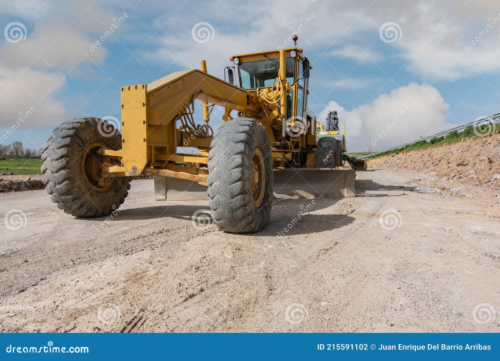 Excavator at a Construction Site, Performing Earth Moving Work ...