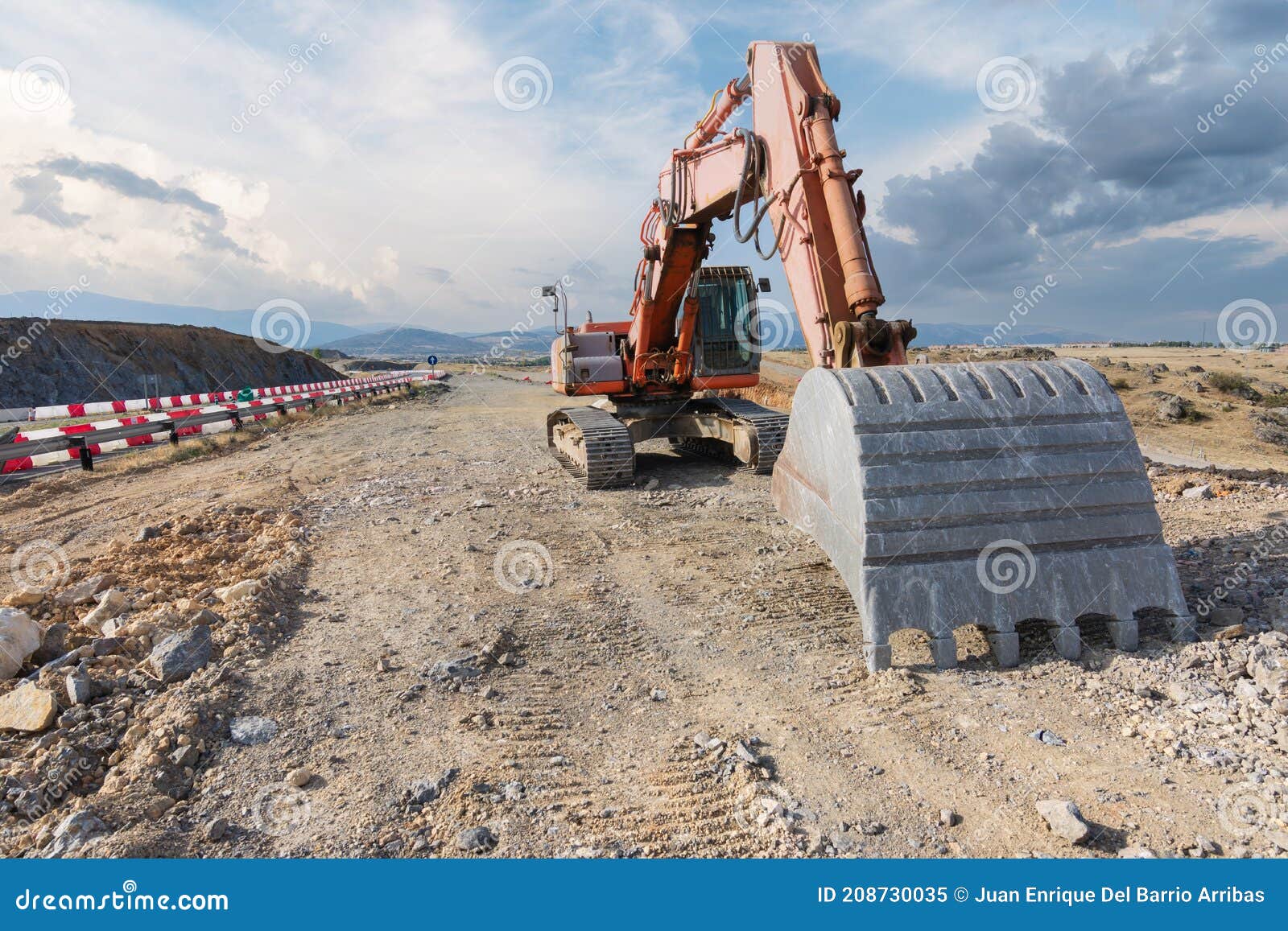 Excavator at the Construction Site of a Road Stock Image - Image of ...