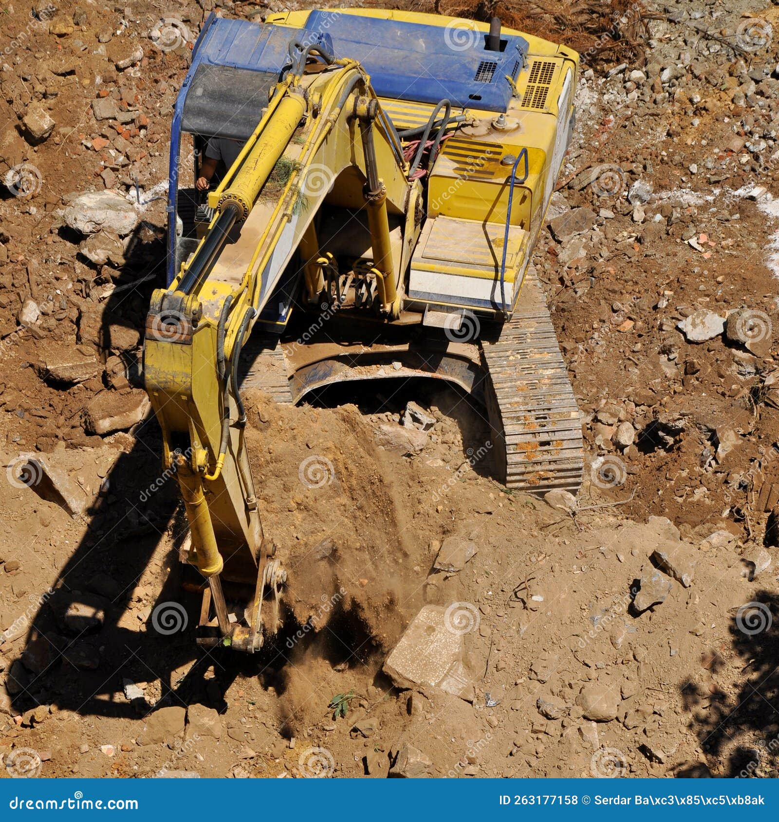 Excavator Continues To Work at the Construction Site Stock Photo ...