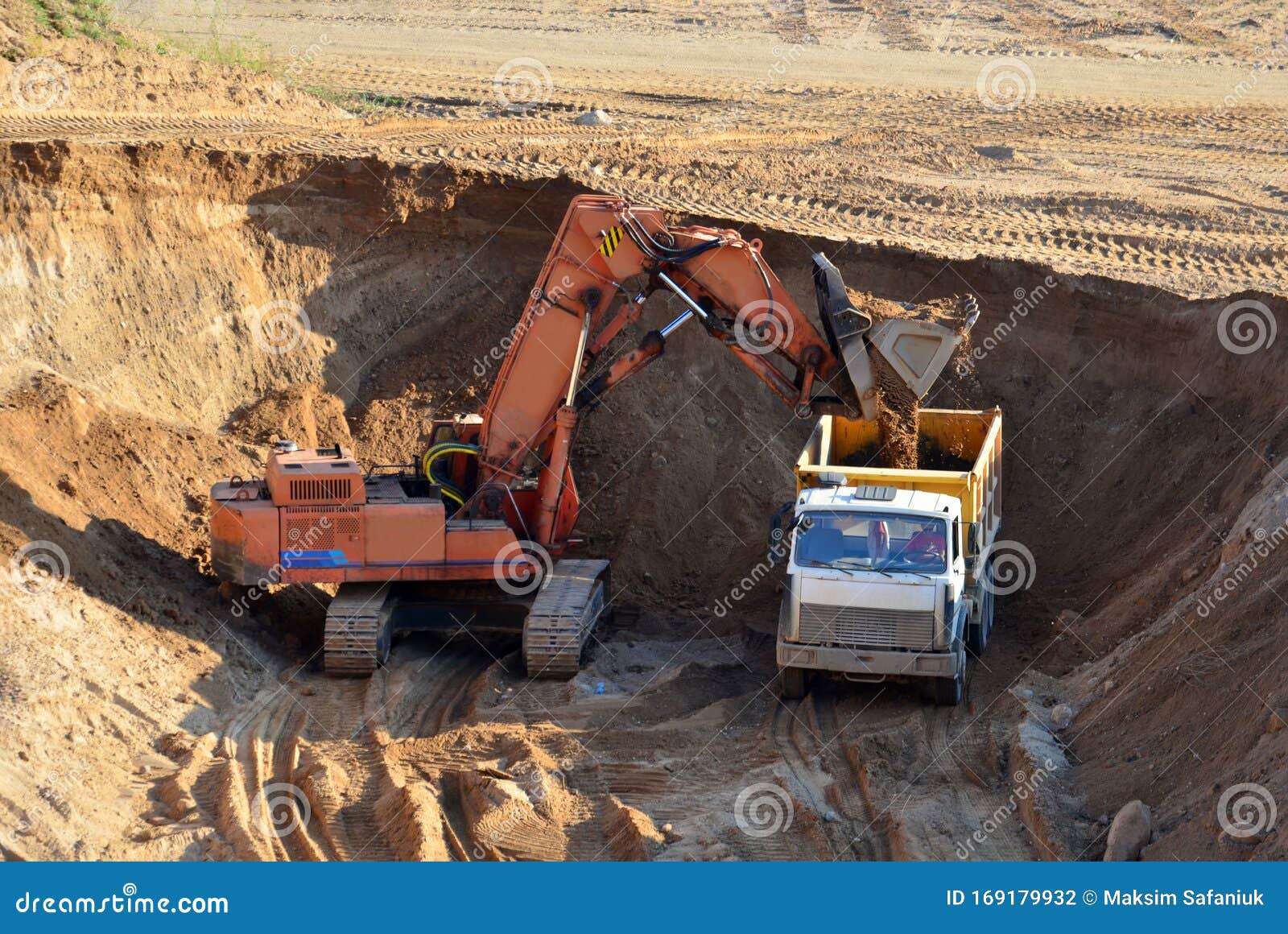 Mining, Loading Coal Into A Dump Truck With An Excavator. Editorial ...