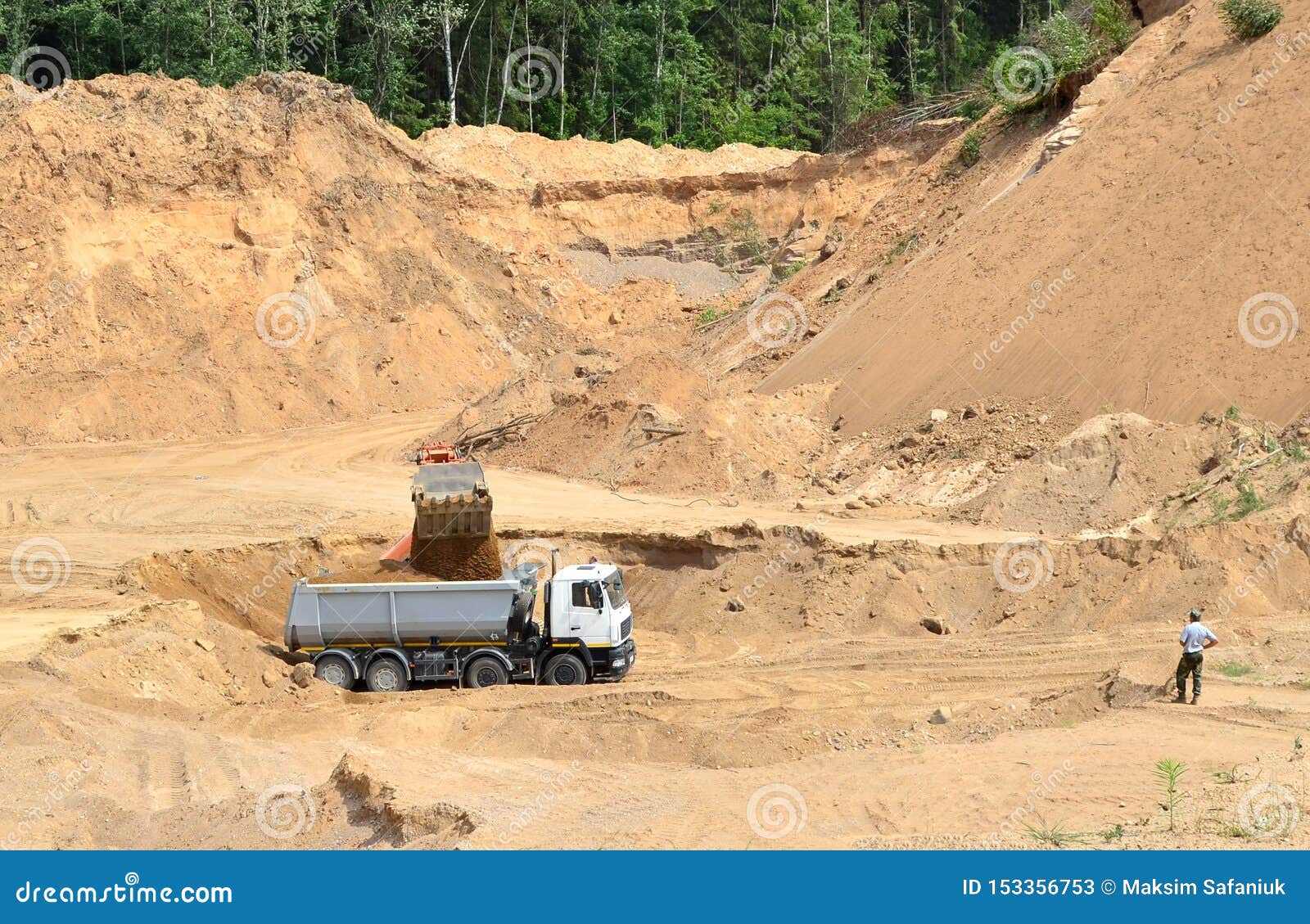 Excavator Developing the Sand on the Opencast and Loading it To the ...