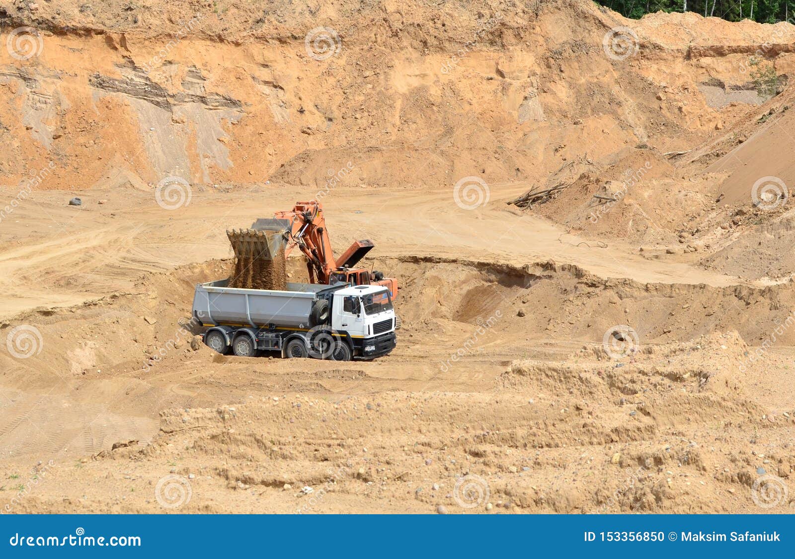 Excavator Developing the Sand on the Opencast and Loading it To the ...