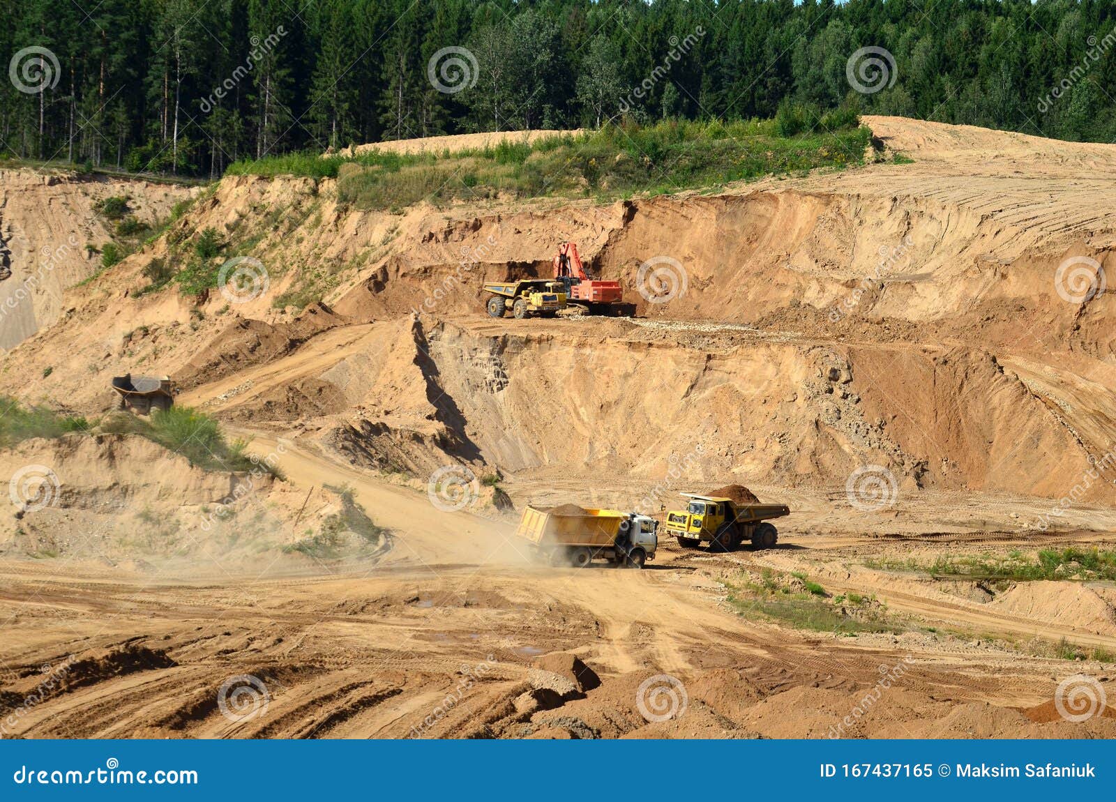 Mining, Loading Coal Into A Dump Truck With An Excavator. Editorial ...