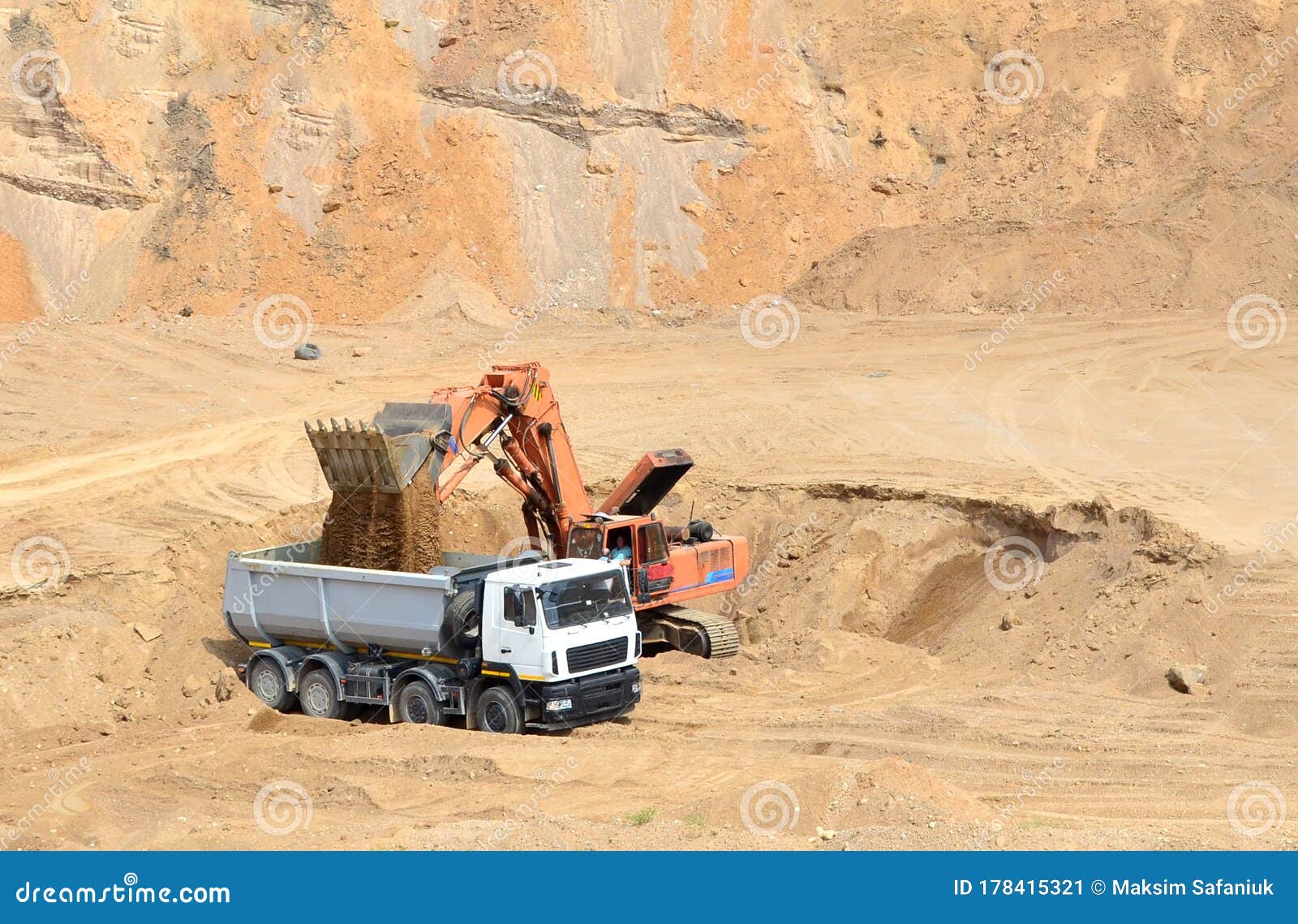 Excavator Developing the Sand on the Opencast and Loading it To the ...