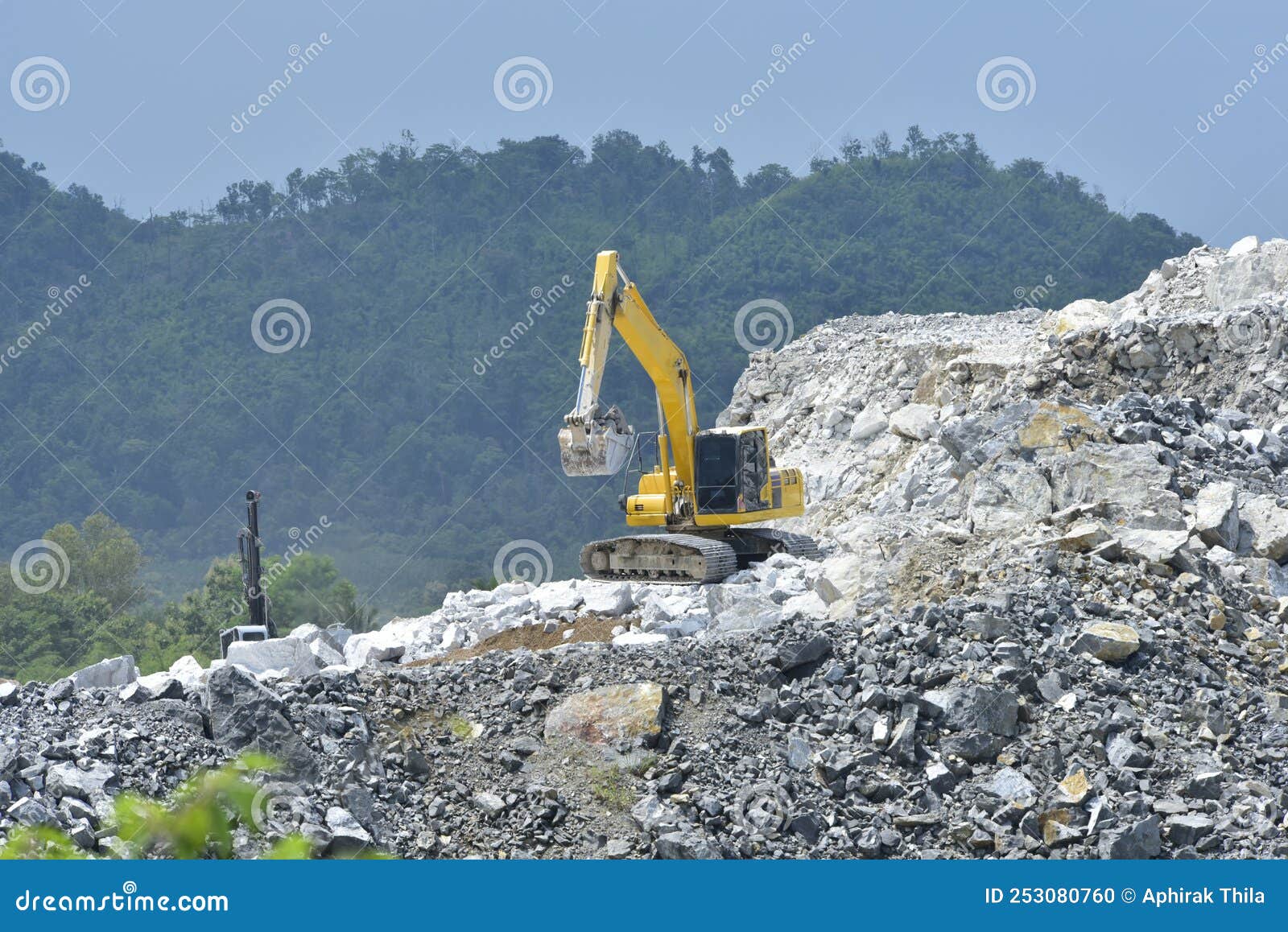 Excavator Dig Ground at Construction Site. Earthmover on Road ...
