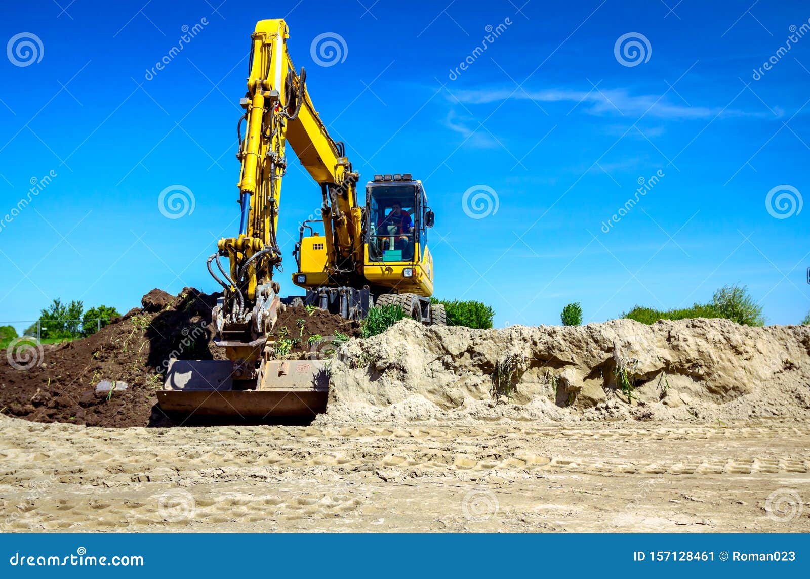 Excavator is Digging on Building Site Editorial Photo - Image of ...