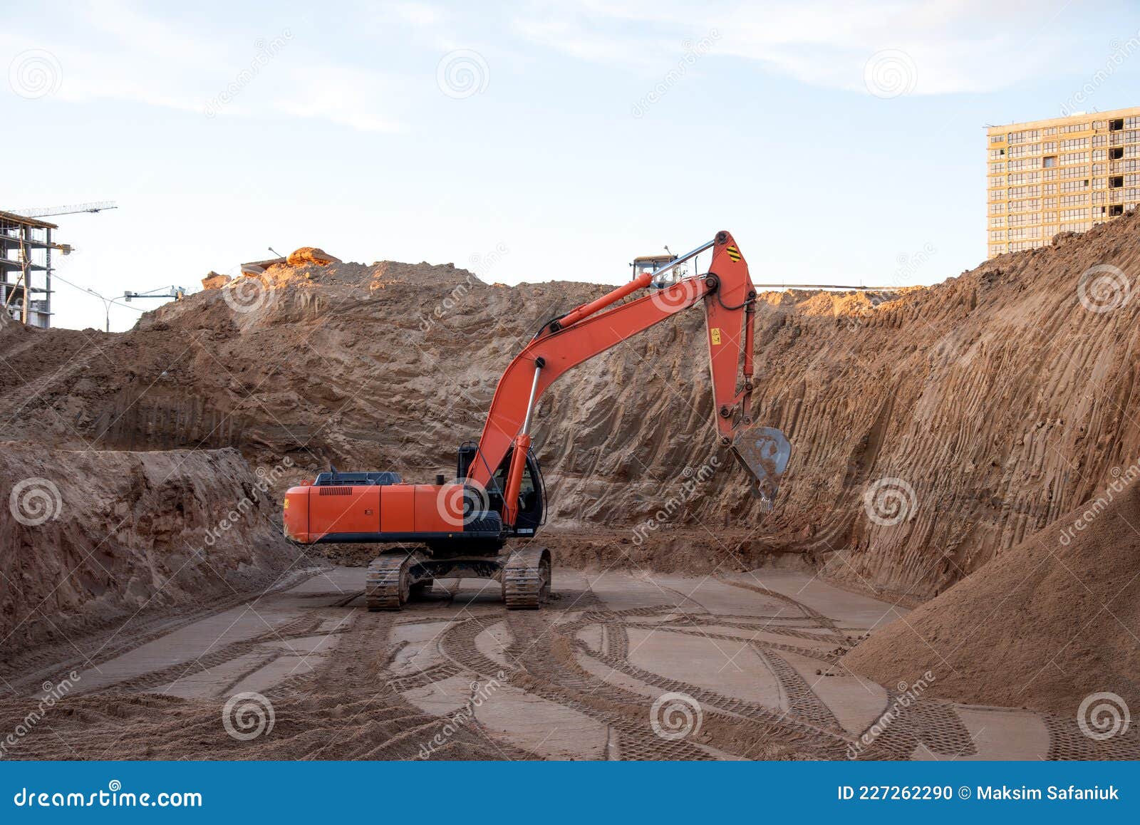Excavator Digging Foundation at Construction Site. Heavy Machinery for ...