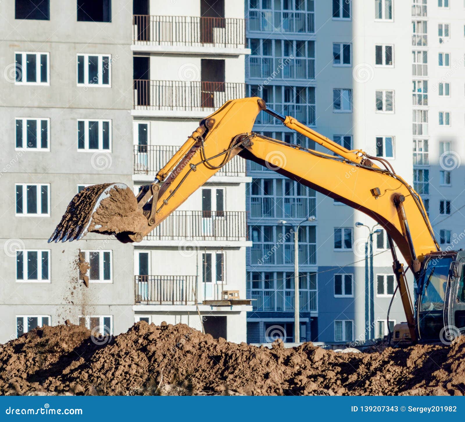 Excavator Digging the Ground at the Construction Site Stock Image ...