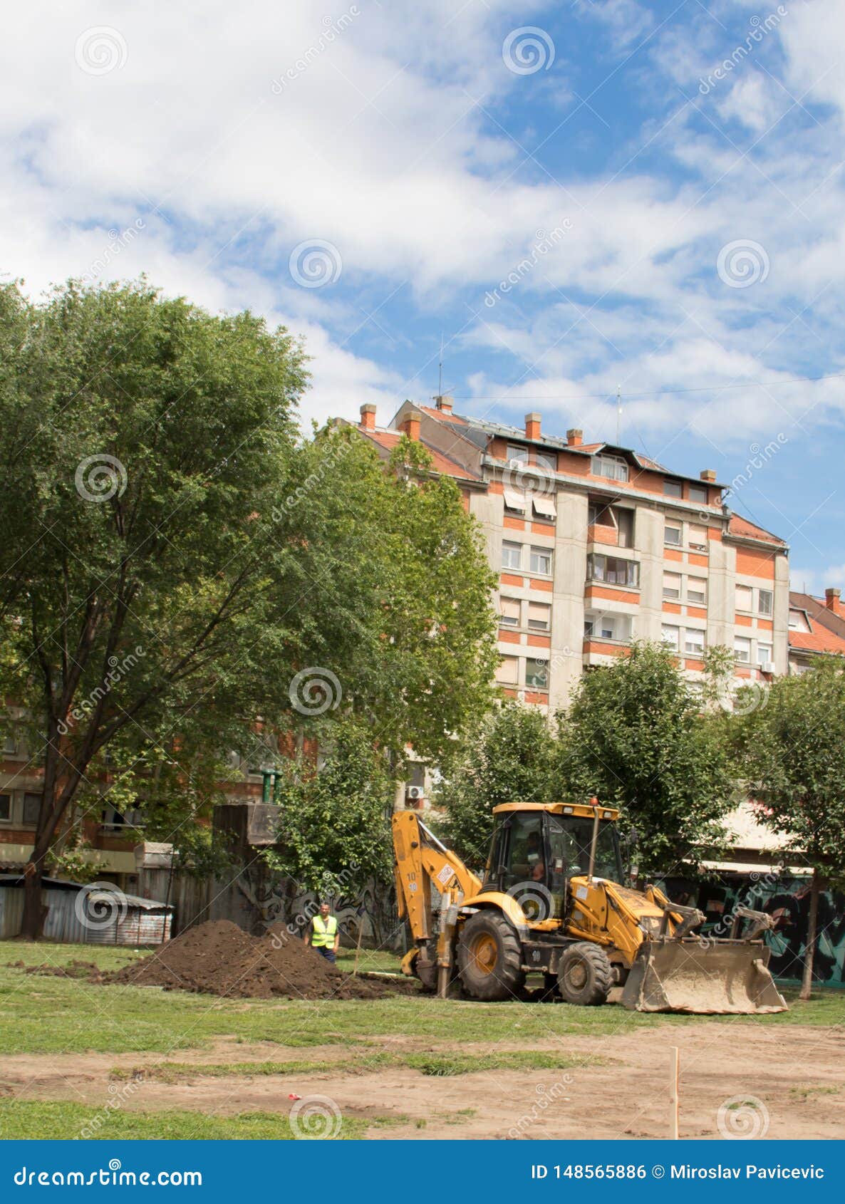 Excavator Digging The Ground And Man At Work Editorial Image ...