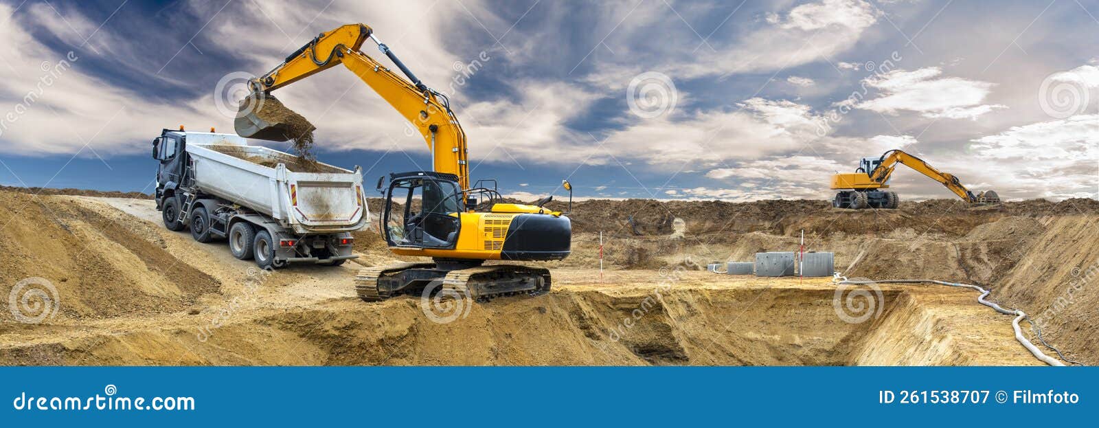 Excavator is Digging and Loading at Construction Site Stock Image ...
