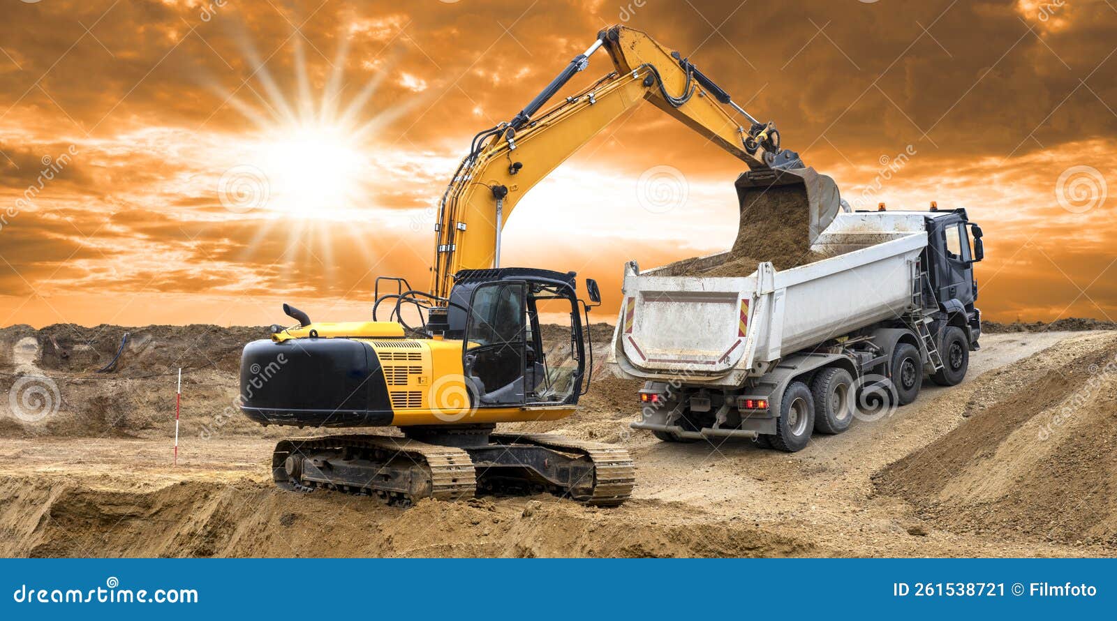 Excavator is Digging and Loading at Construction Site Stock Image ...