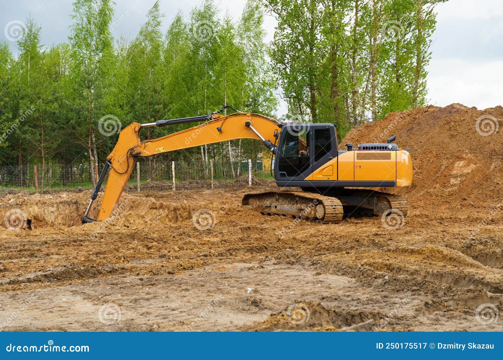 An Excavator is Digging a Pit for a House. Stock Image - Image of ...
