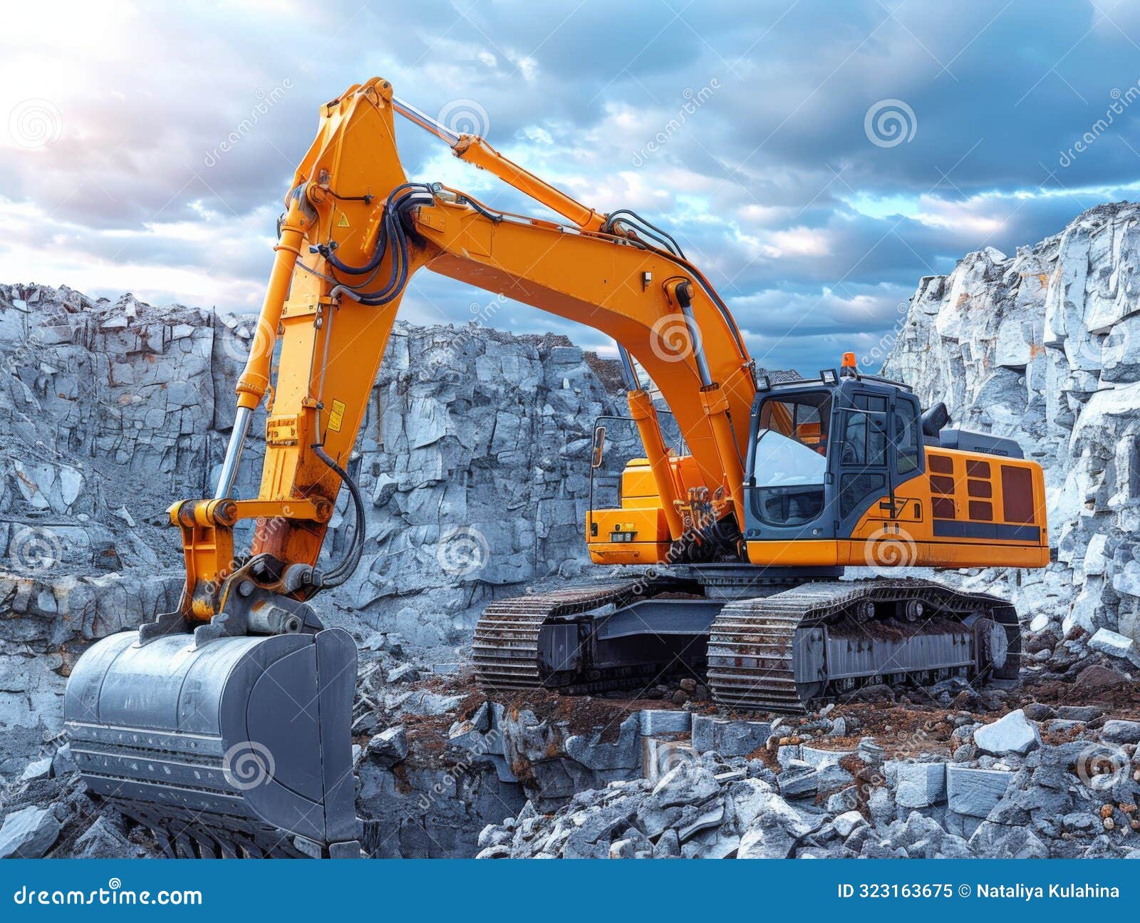 Excavator Digging in a Rocky Area with Overcast Sky Stock Image - Image ...