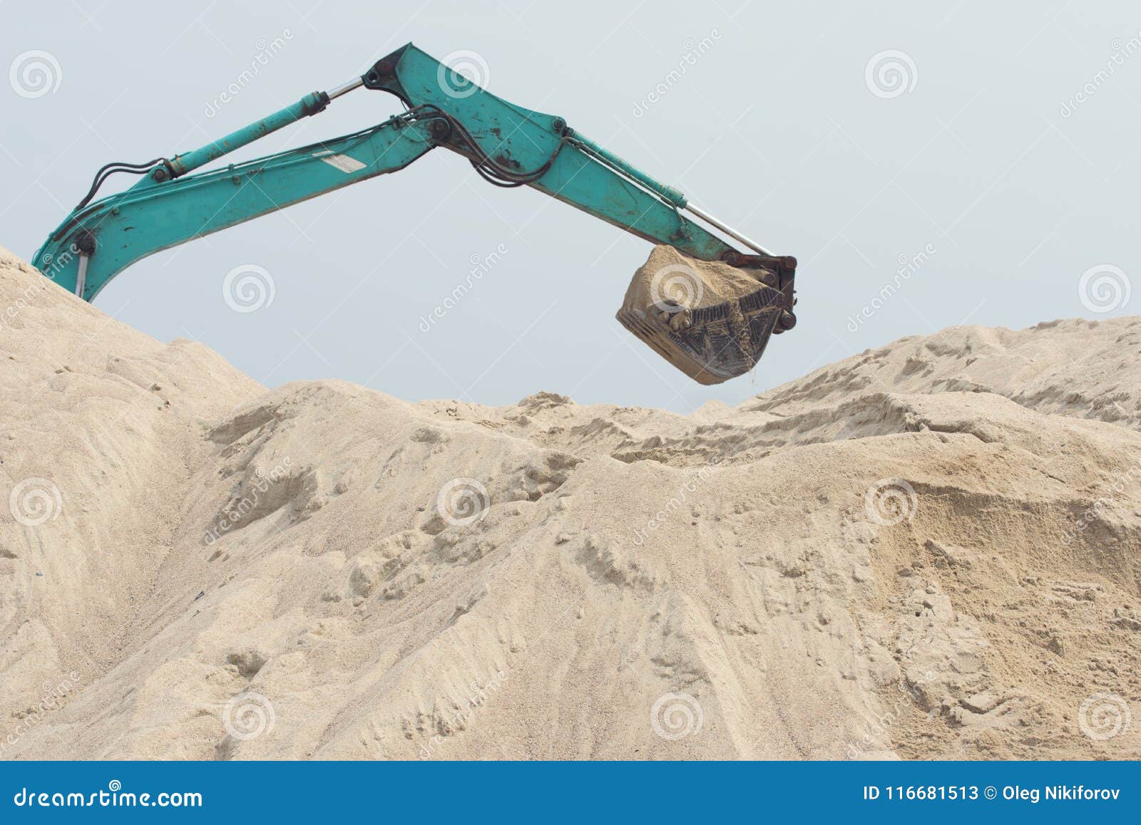 Excavator is digging sand stock image. Image of loader - 116681513