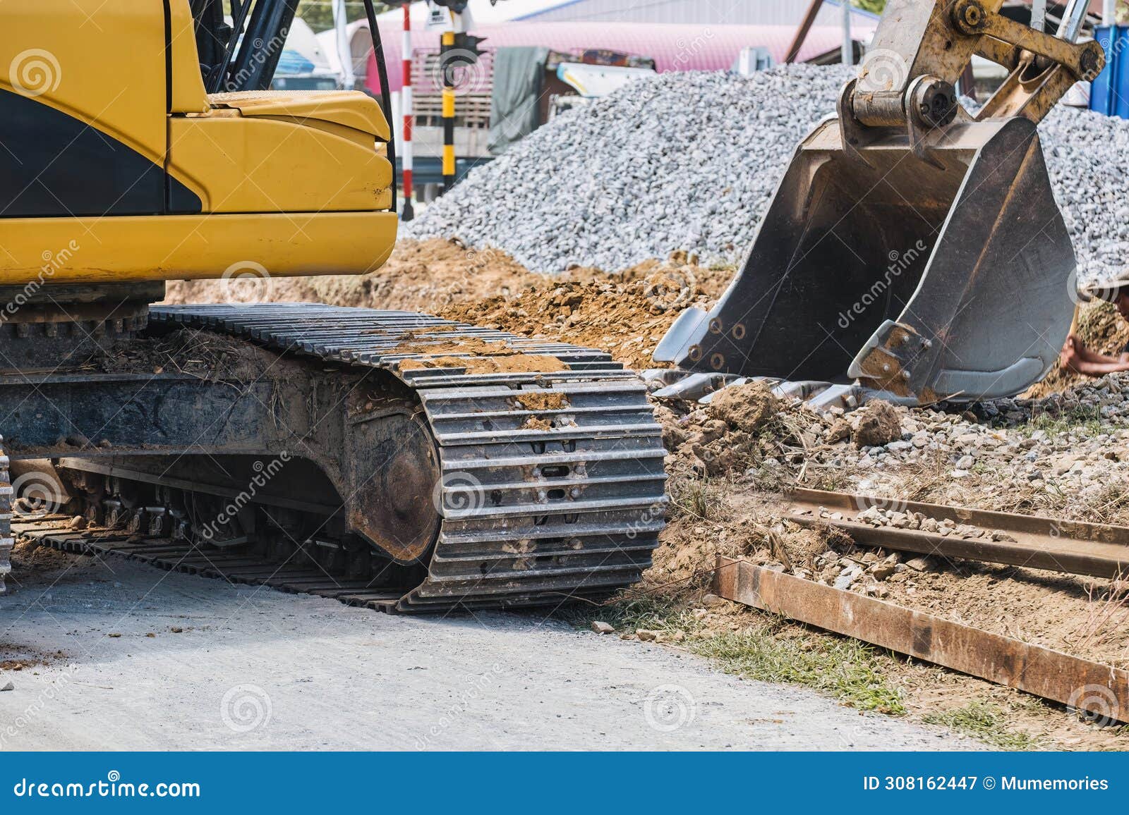 Excavator Digging Soil and Stone on Construction Site Stock Image ...