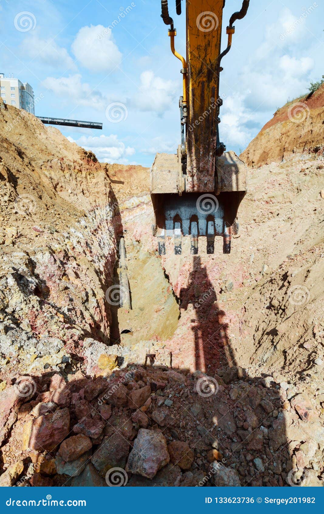 Excavator Digging a Trench for the Pipeline Stock Photo - Image of ...