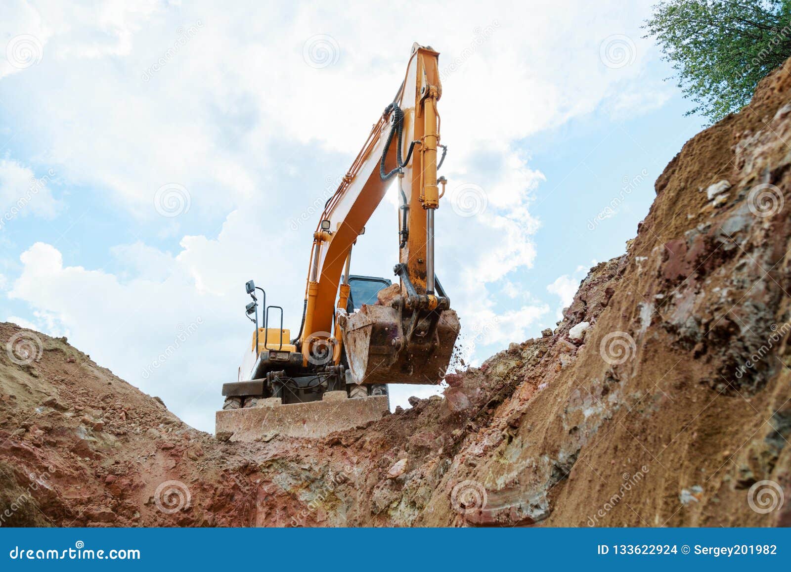 Excavator Digging a Trench for the Pipeline Stock Photo - Image of ...