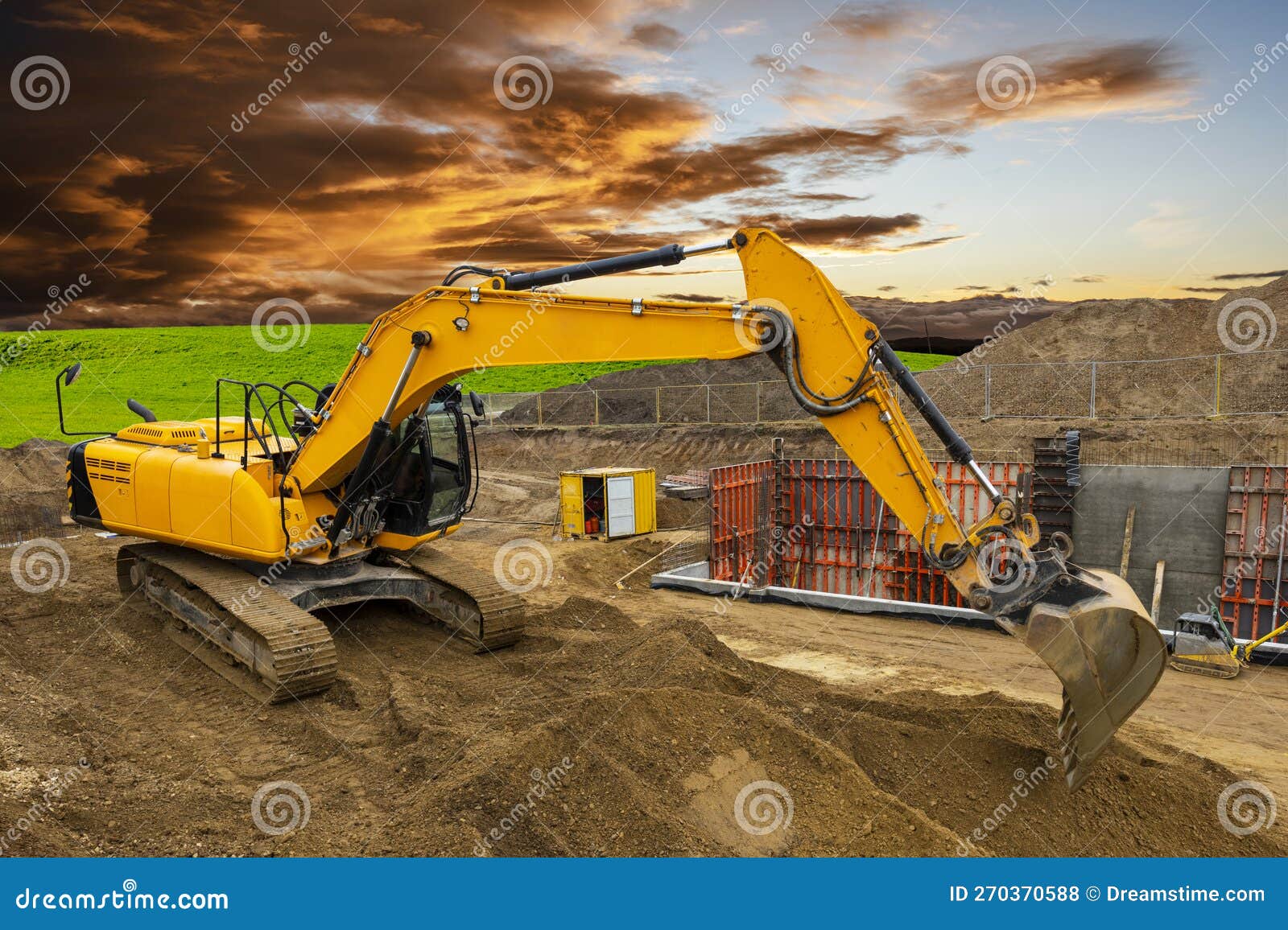 Excavator is Digging and Working at Construction Site Stock Photo ...