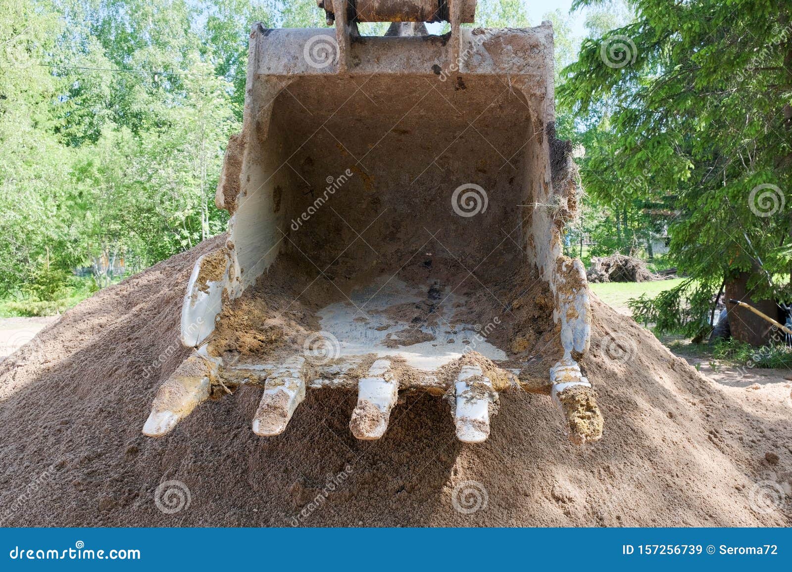 Excavator Digs Clay Soil at the Construction Site Stock Image - Image ...