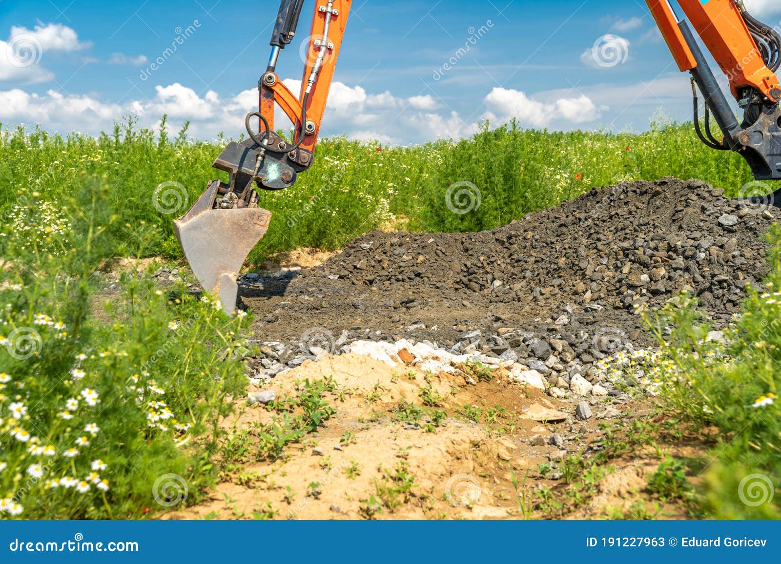 The Excavator Digs Gravel for Road Construction Stock Image - Image of ...