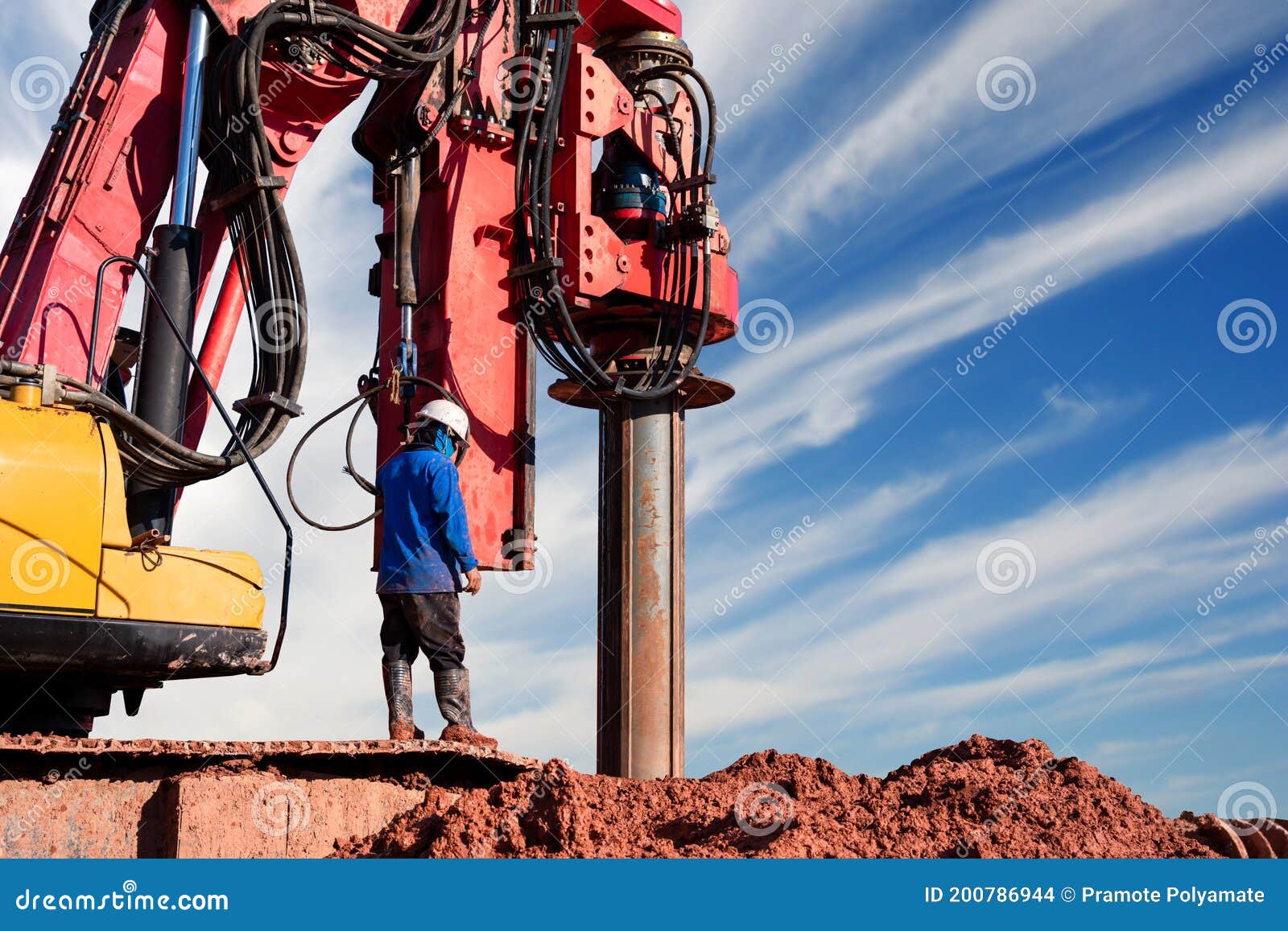 Excavator With Drilling Attachments At Construction Site. Rock Drill ...