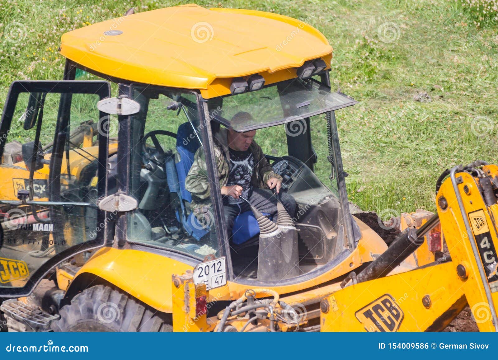 Excavator Driver for Control Levers Editorial Photo - Image of person ...