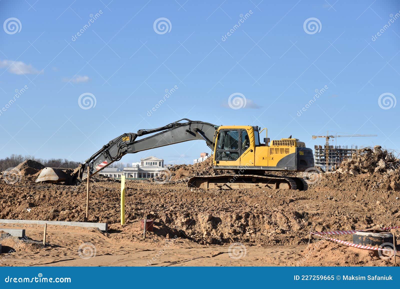 Excavator during Earthmoving Work at Construction Site Stock Image ...