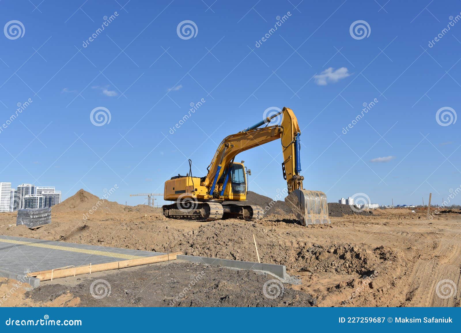 Excavator during Earthmoving Work at Construction Site Stock Image ...