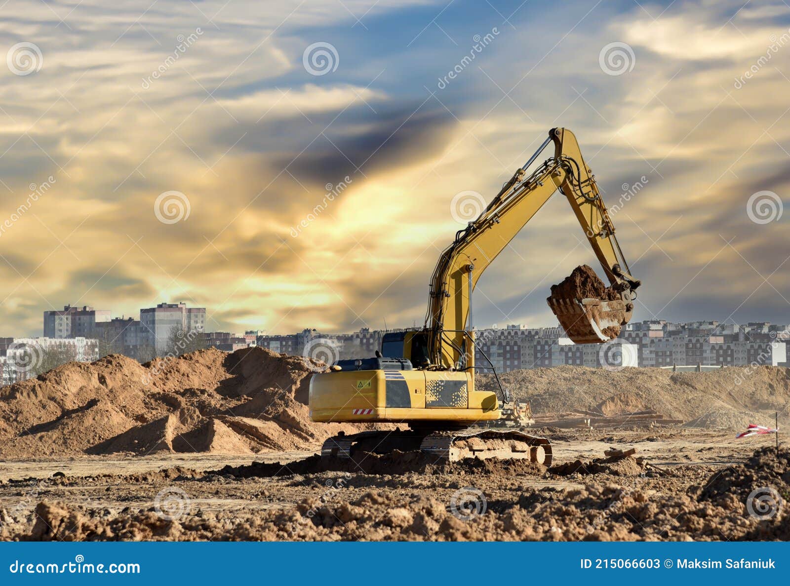 Excavator during Earthmoving Work at Construction Site on Sunset ...