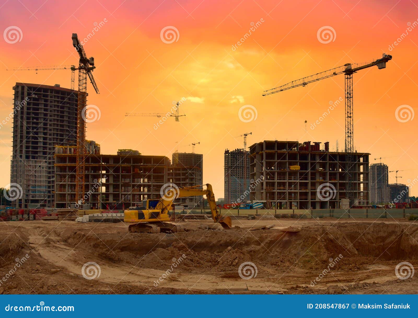 Excavator During Earthmoving Work At Construction Site On Sunset ...