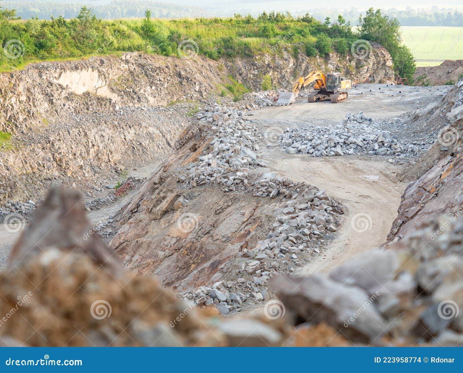 Excavator during Earthmoving Work at Open-pit Mining on Gravel Quarry ...