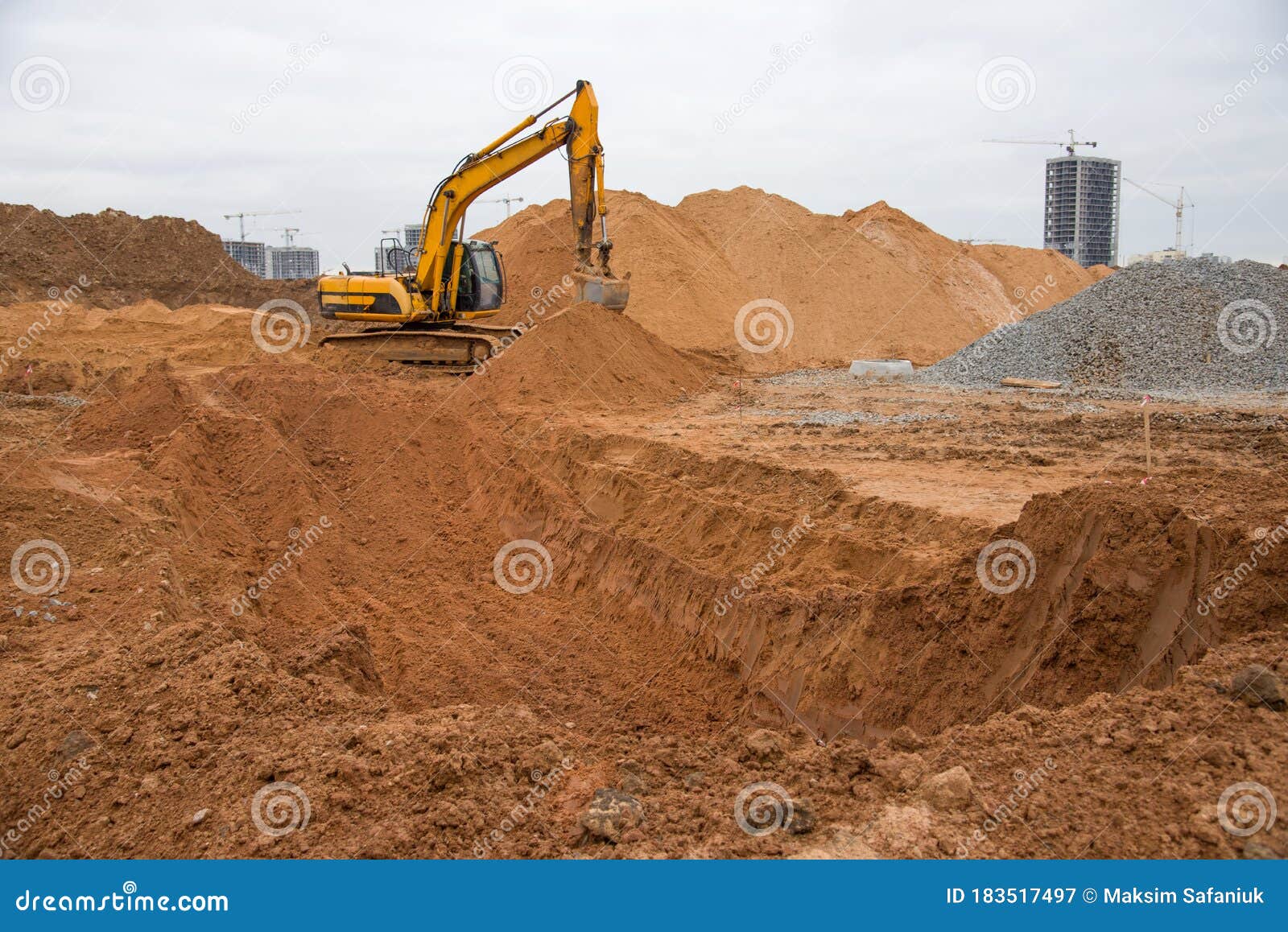 Excavator at Earthworks on Construction Site. Backhoe Loader Digs a Pit ...