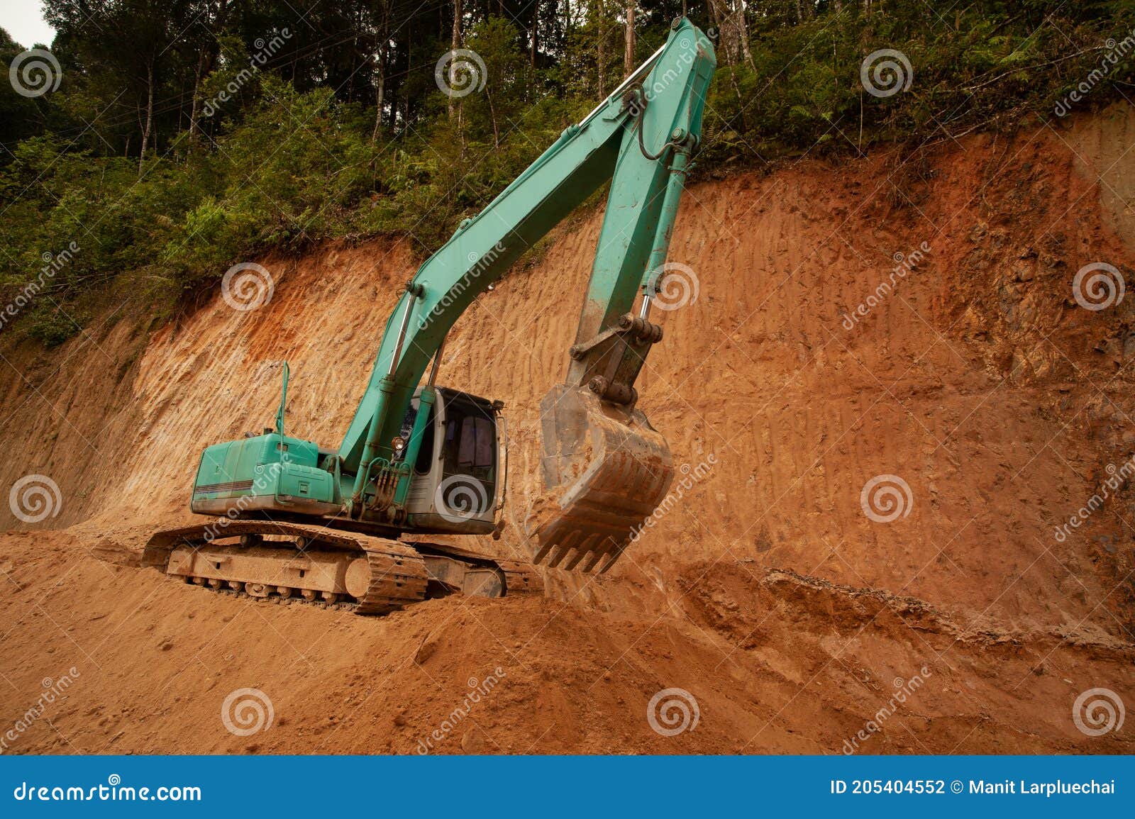 Digging The Pit Foundation A Hole With Excavator At The Construction ...