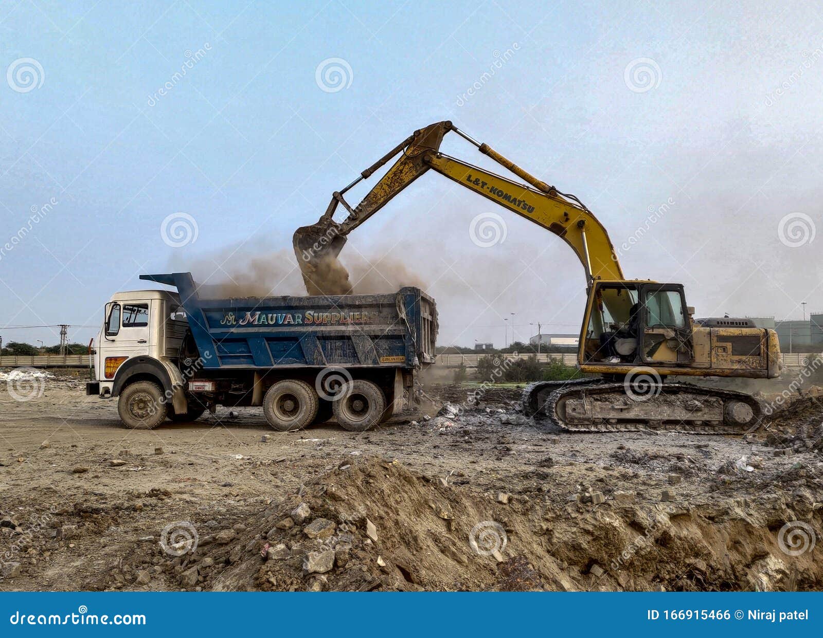 Excavator Filling Deep Excavation Supported By Trench Box With Pipe ...