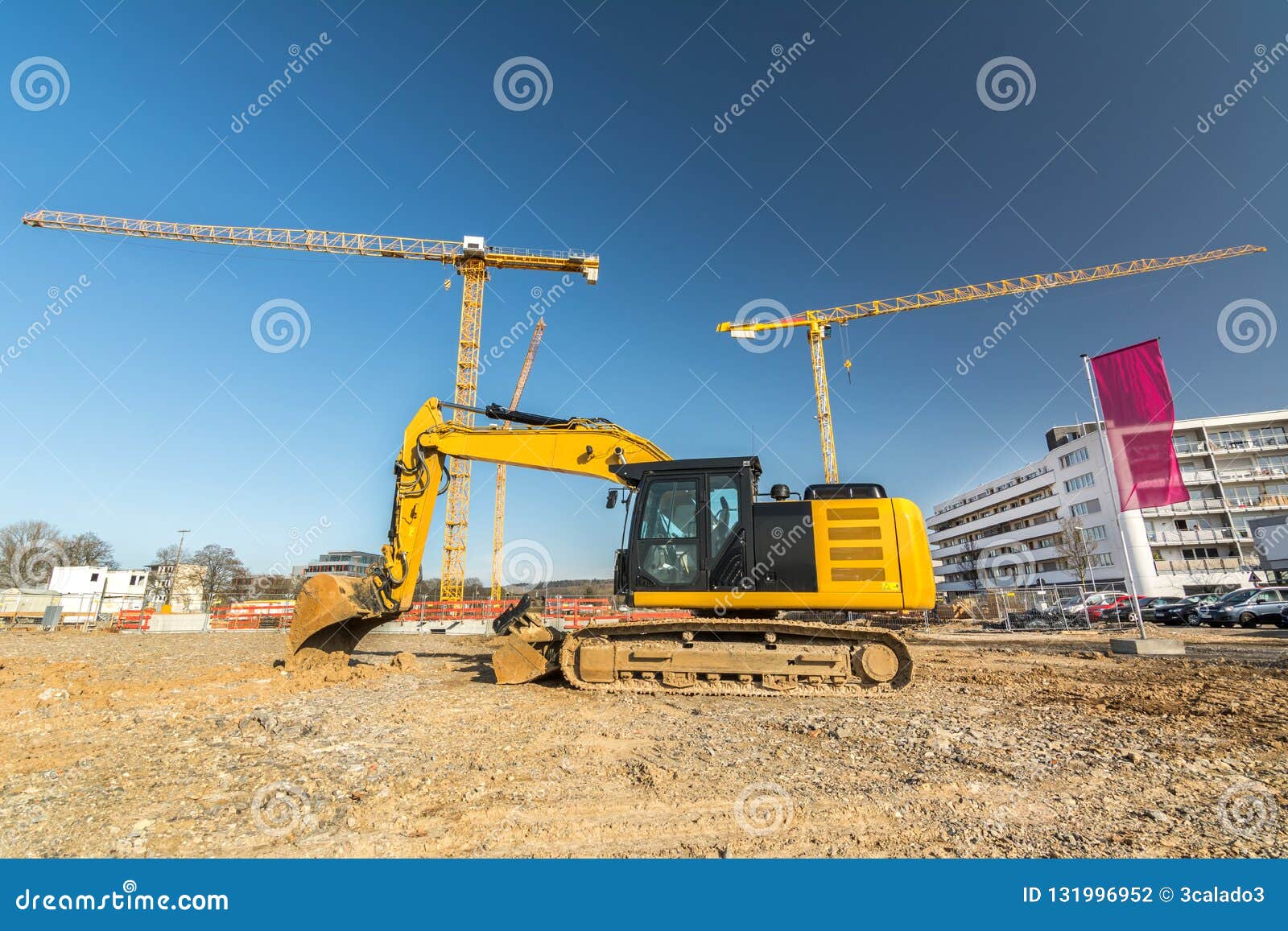 Excavator in Front of Building Site Stock Photo - Image of boom ...
