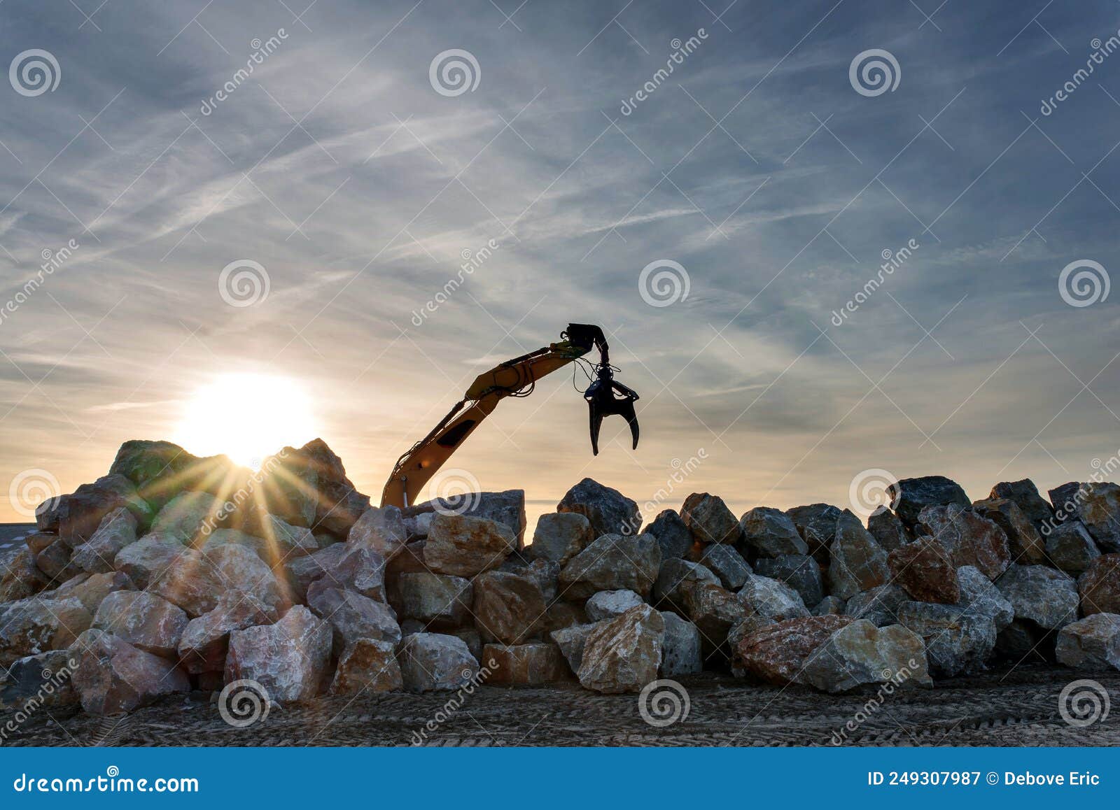 Backhoe with a Grapple in Action on a Construction Site Close Up Stock ...