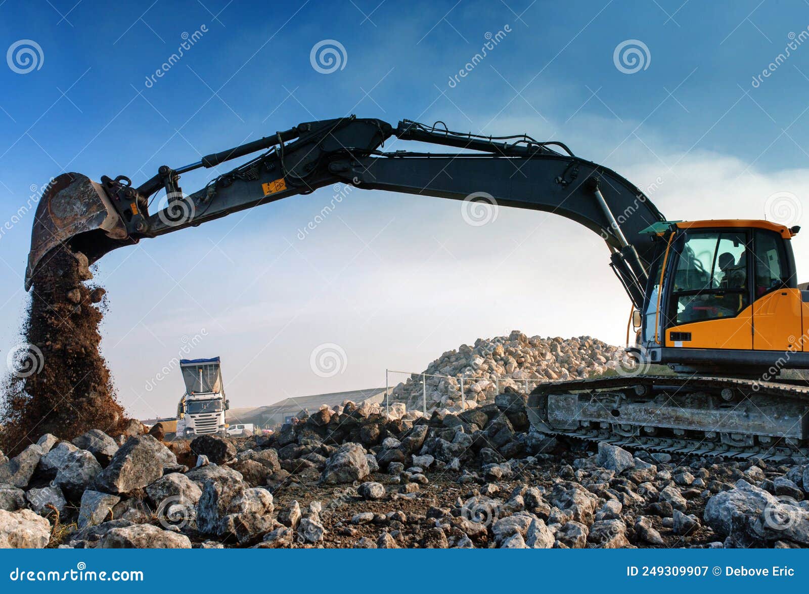 Backhoe in Action on a Construction Site Close Up Stock Image - Image ...