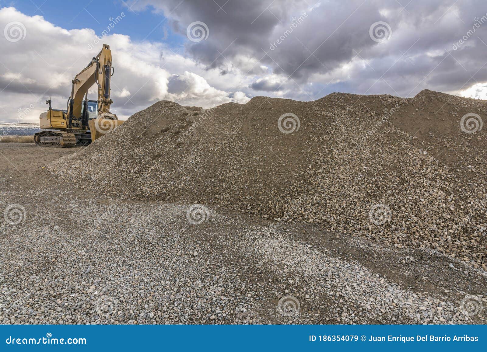 Excavator and Heavy Machinery for Processing Rock and Stone in a Quarry ...