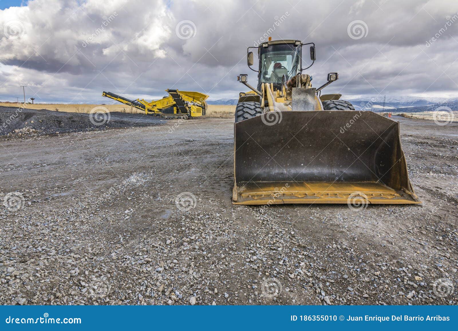 Excavator and Heavy Machinery for Processing Rock and Stone in a Quarry ...