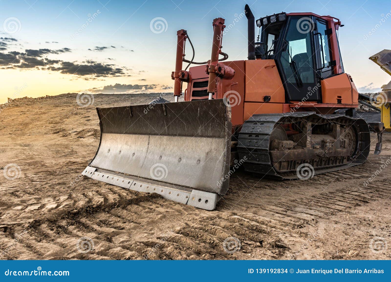 Excavator Leveling Ground in a Construction Stock Photo - Image of ...