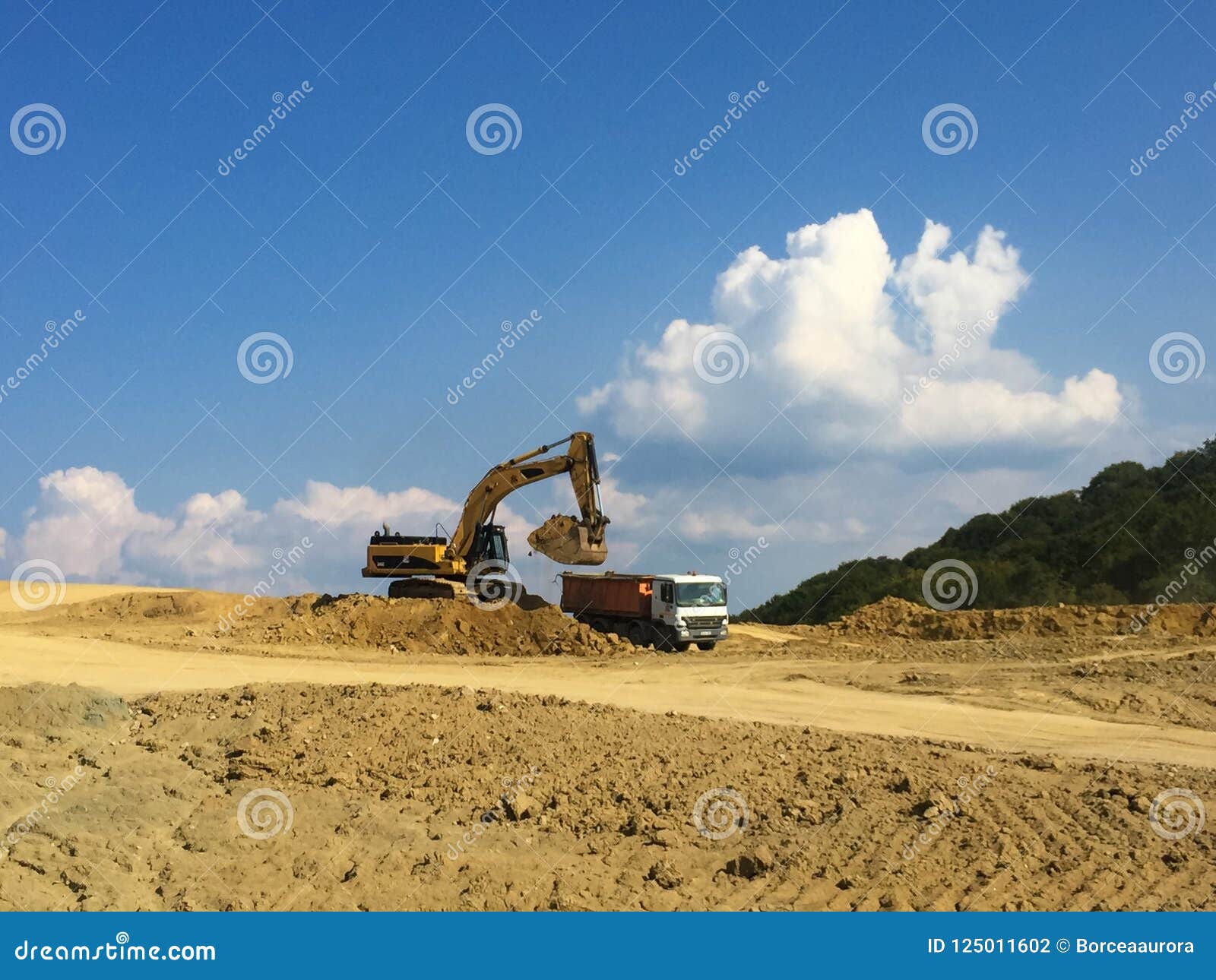 Excavator Leveling the Ground Stock Photo - Image of construction ...