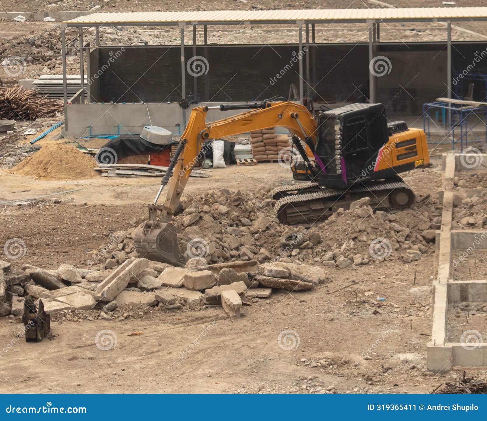 An Excavator Levels the Ground at a House Construction Site Stock Image ...