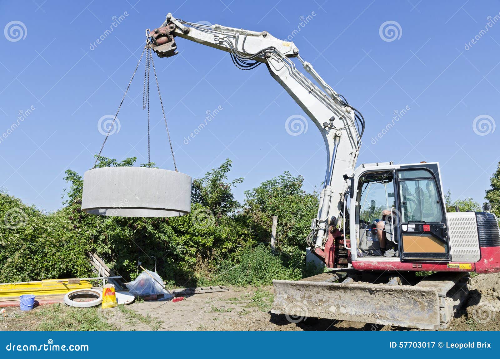 Excavator Llifting Concrete Ring Stock Image - Image of rings, talus ...