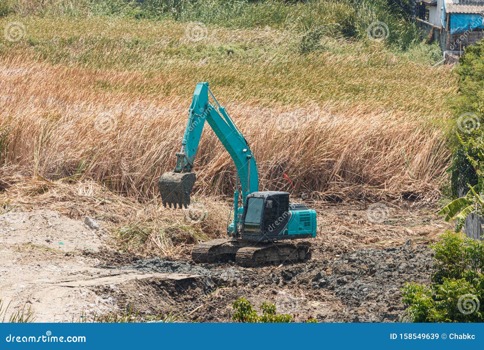 Excavator Loader in the Field Area Digging Stock Image - Image of ...