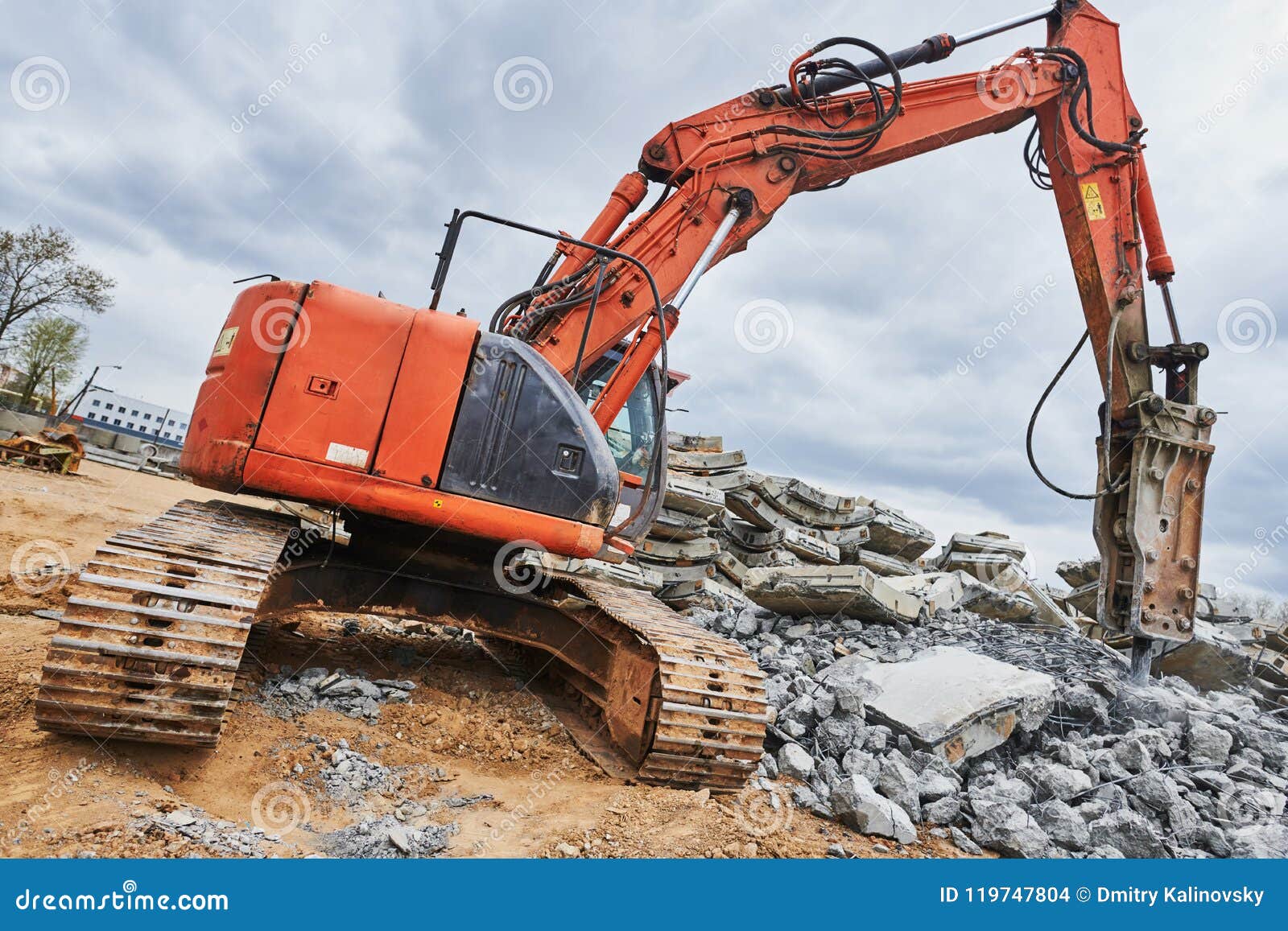 Excavator And Hydrohammer During Quarrying On The Rocky Soils. Heavy ...