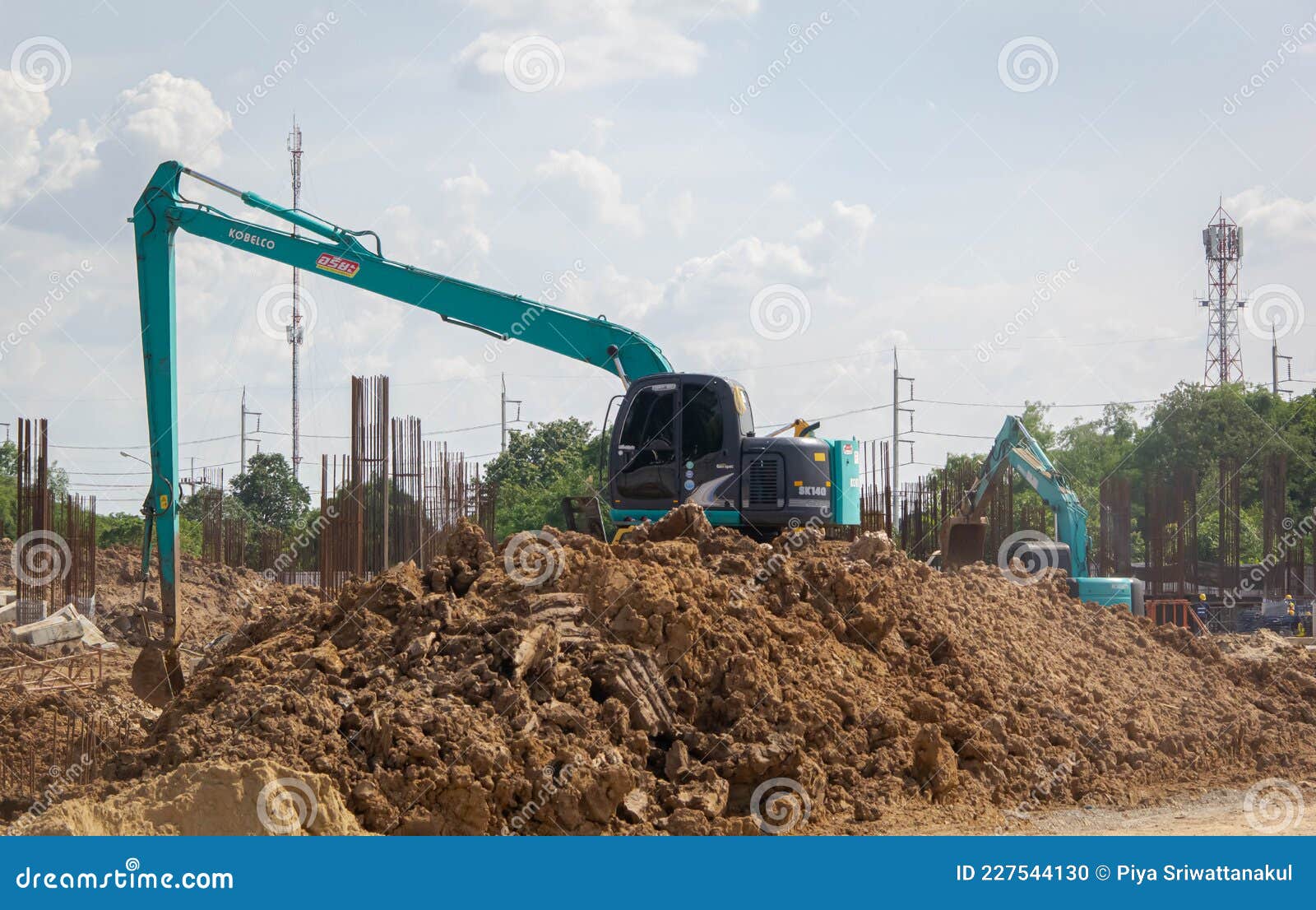 Excavator Loader And Dump Truck During Earthworks At A Construction ...