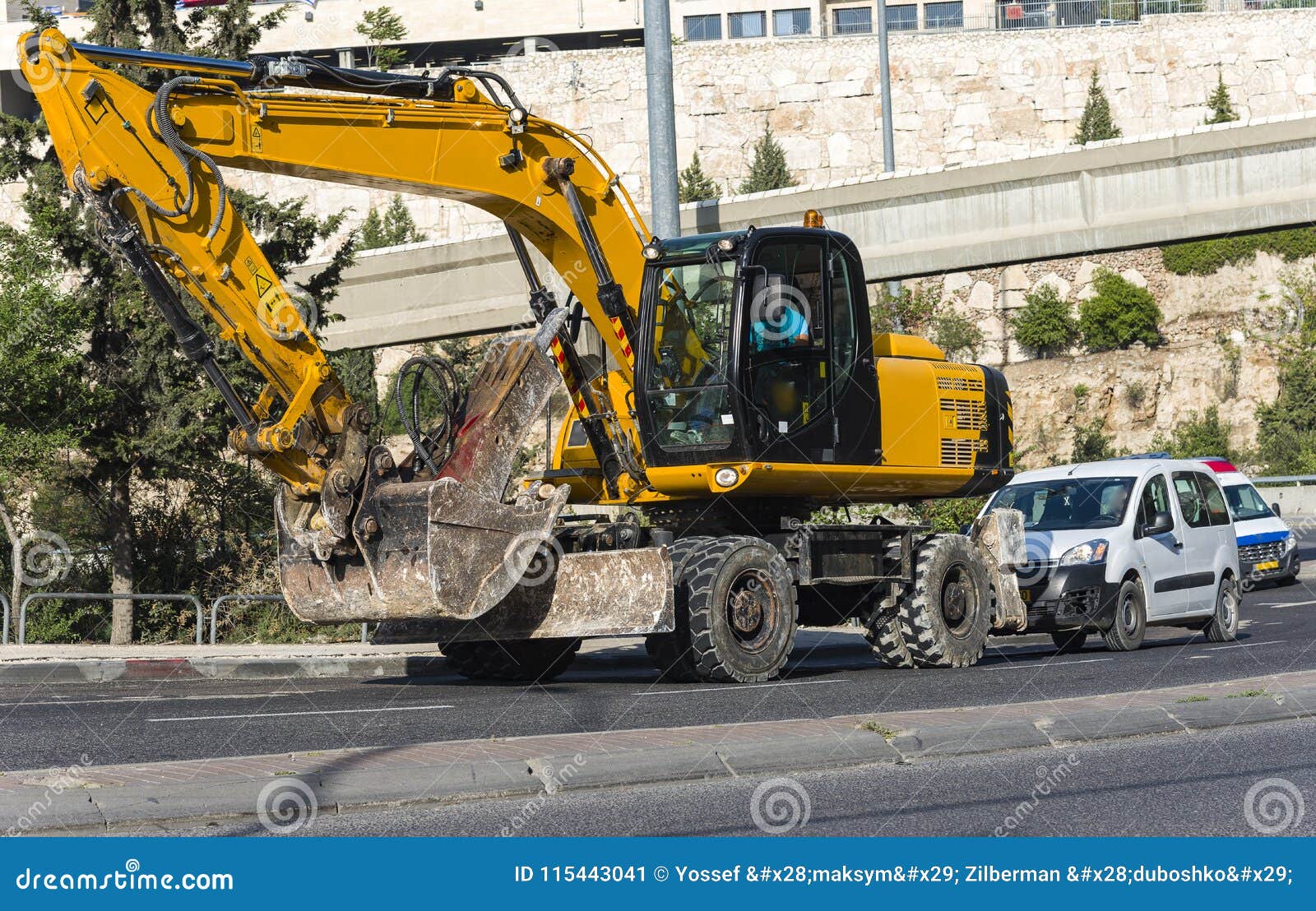 Yellow Excavator Machine with Risen Boom Construction Site Stock Image ...
