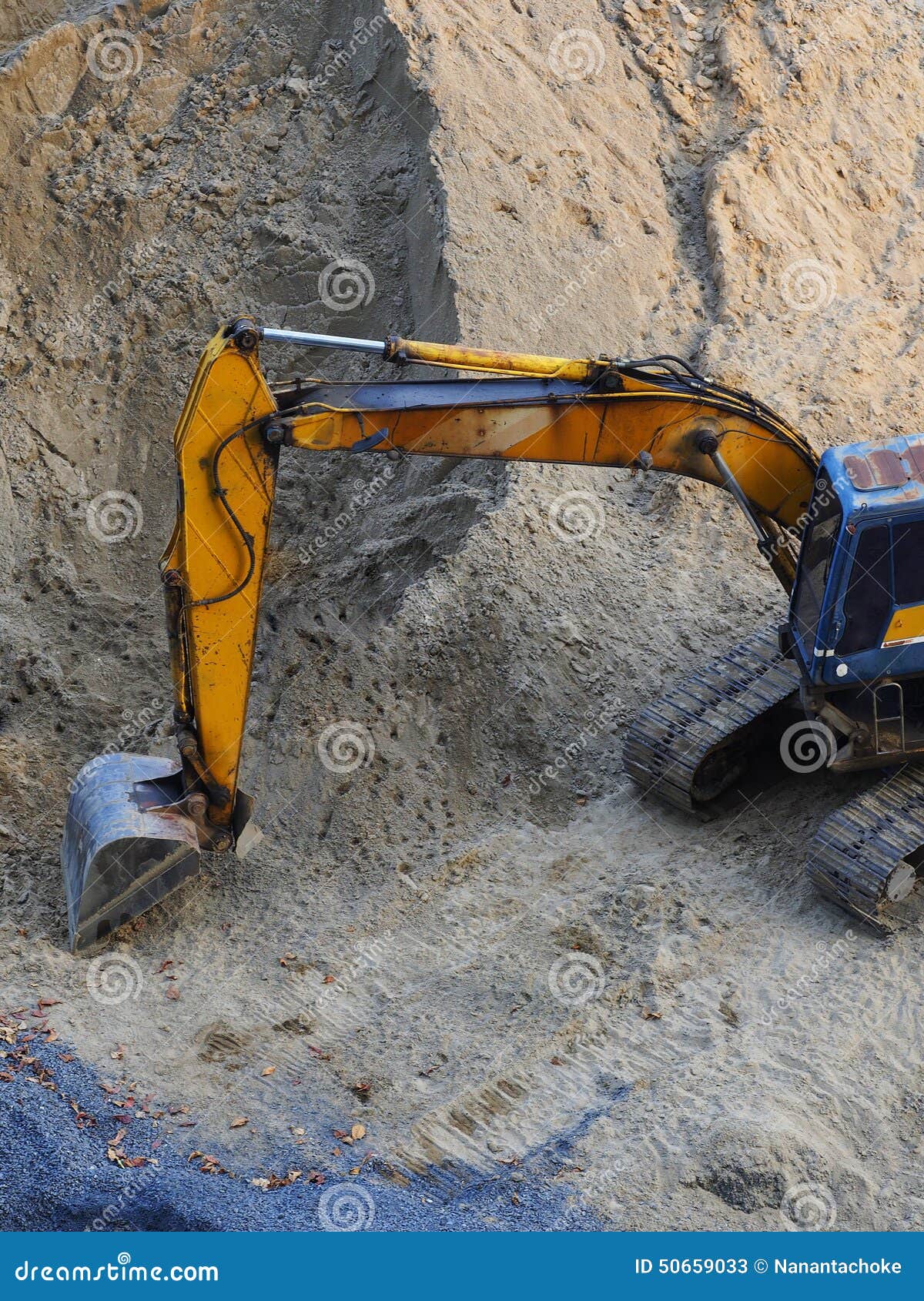 Excavator Loader with Rised Backhoe Standing in Sand Stock Image ...